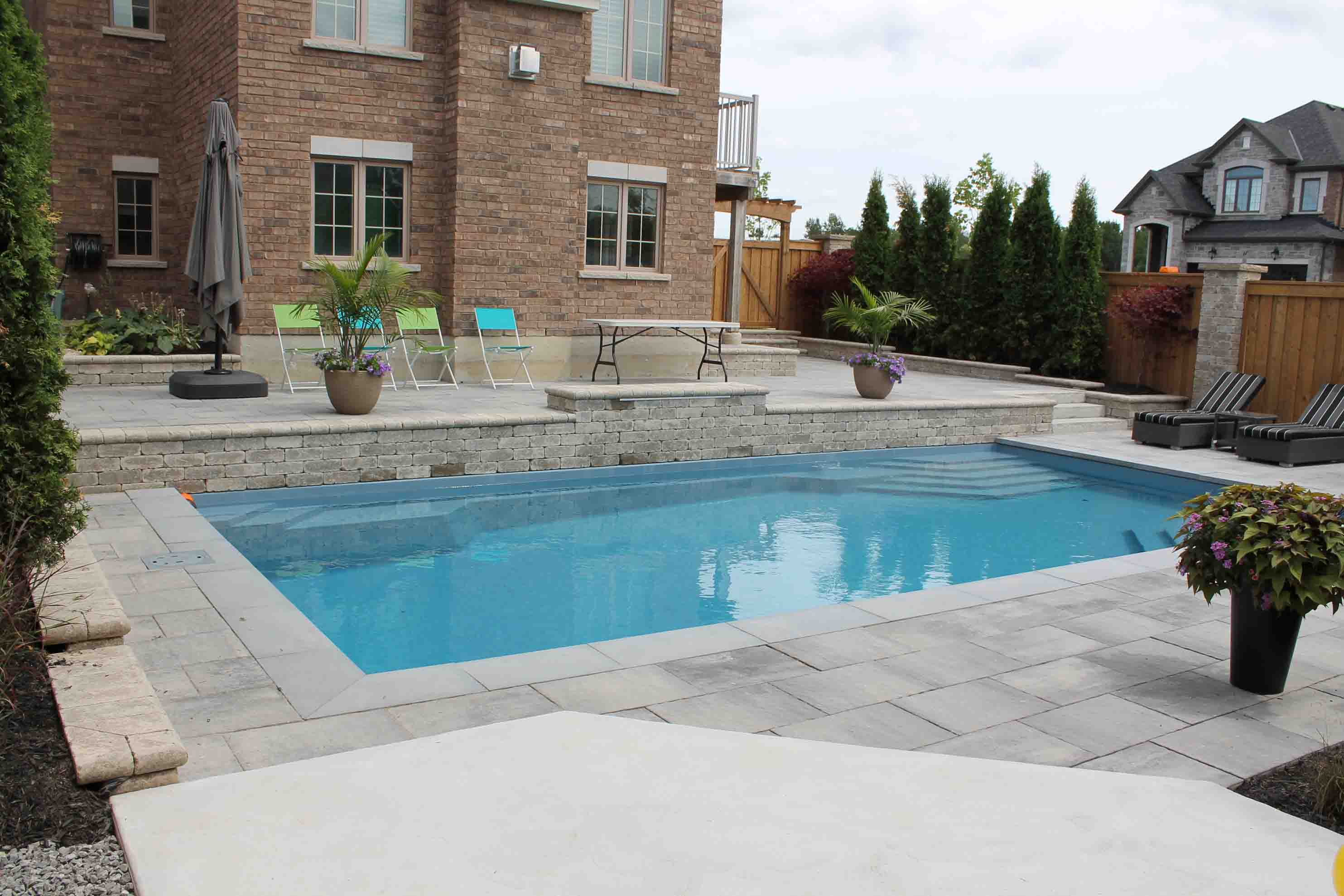 Whitby Pool/Landscape installation - Fiberglass inground swimming pools ...